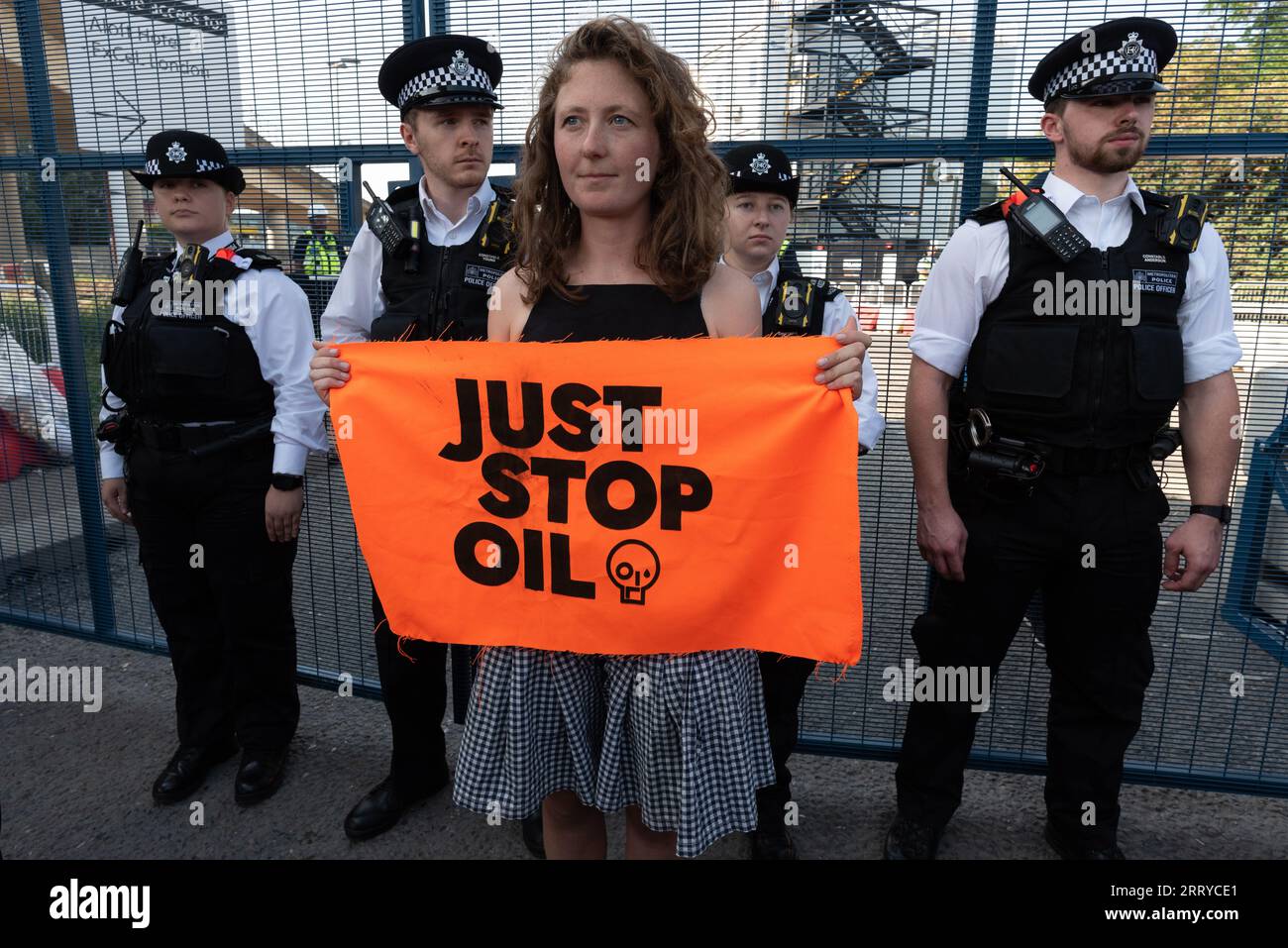 London, UK. 9 September, 2023. A woman stands at the gates of the ExCel ...