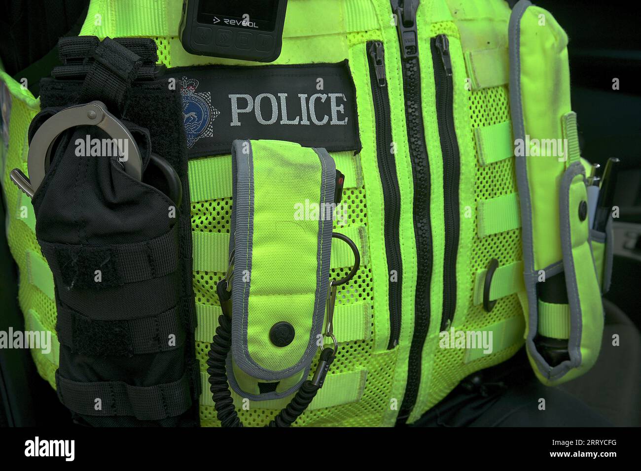 Police hi vis Tactical patrol vest with handcuffs and bodycam Stock ...