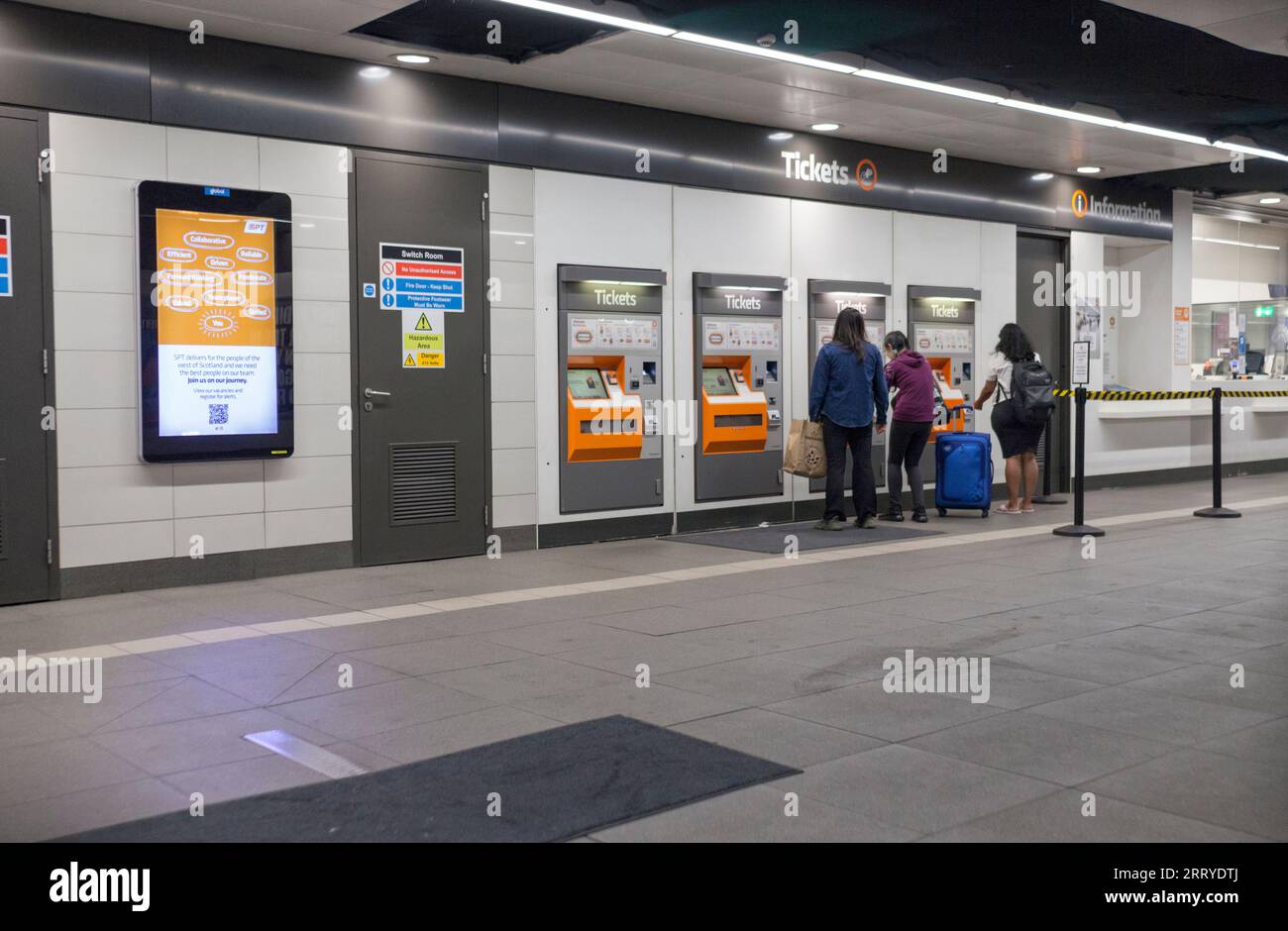 Person using train ticket machine hi-res stock photography and images ...