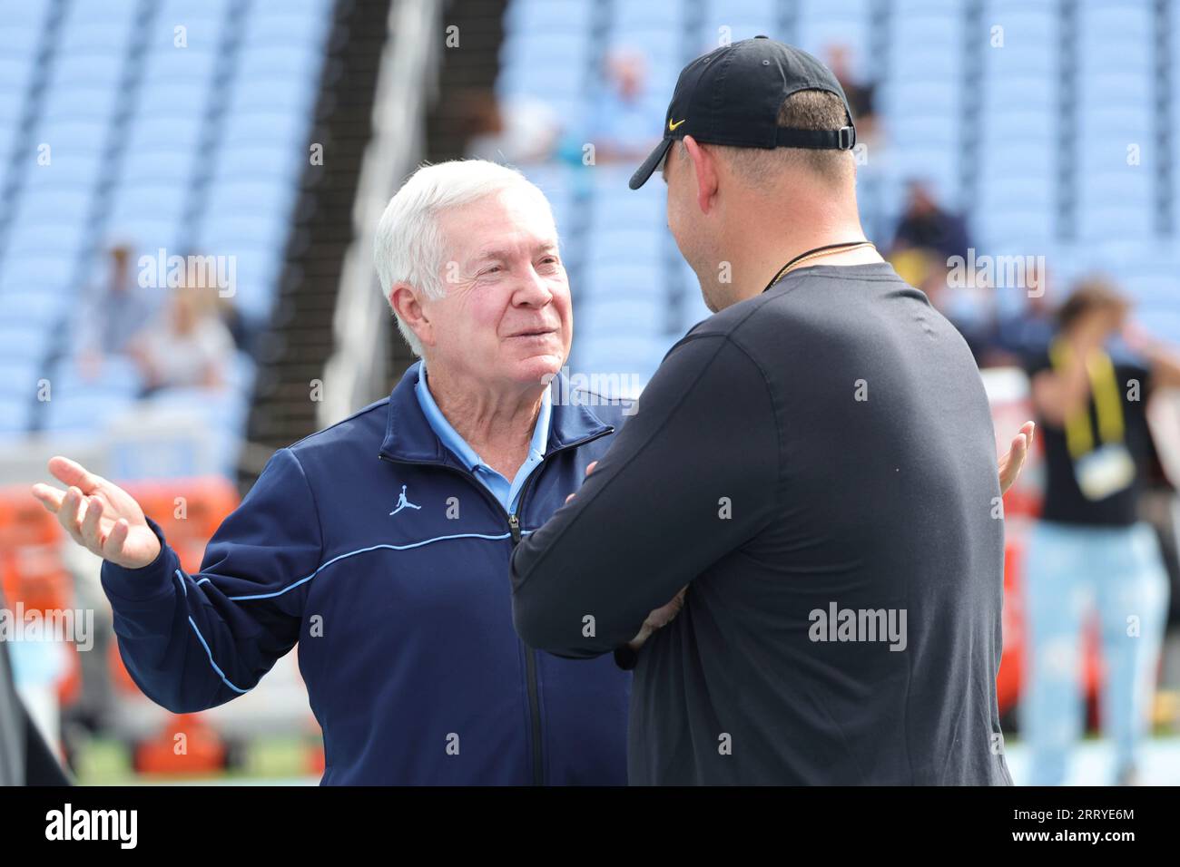 North Carolina head coach Mack Brown, left, and Appalachian State head ...