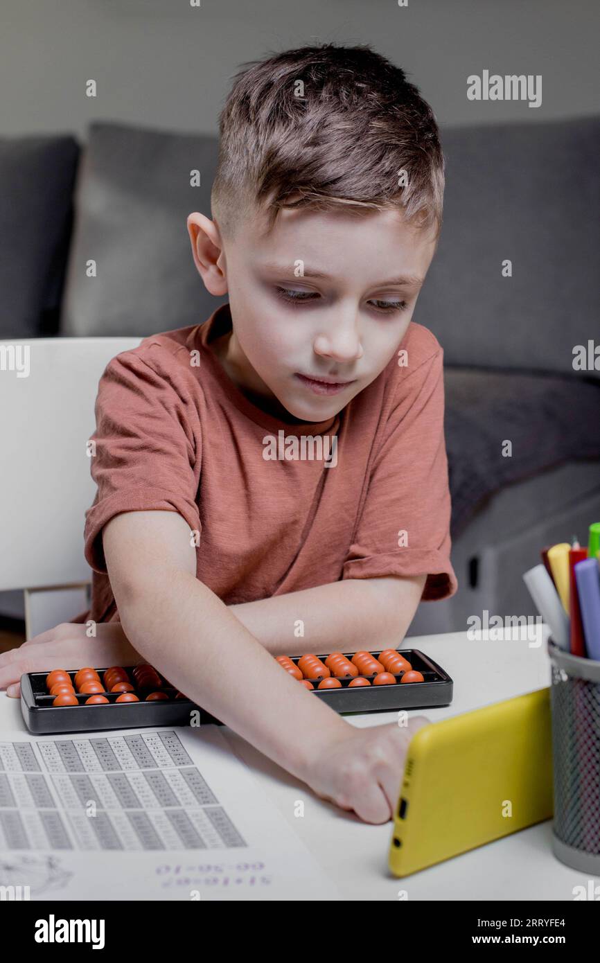 Child calculates an arithmetic problem orally. Mental arithmetic ...