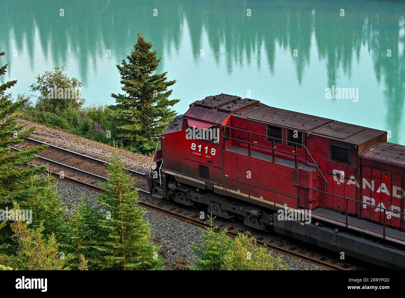 Canadian Pacific locomotive passing through Banff National Park ...