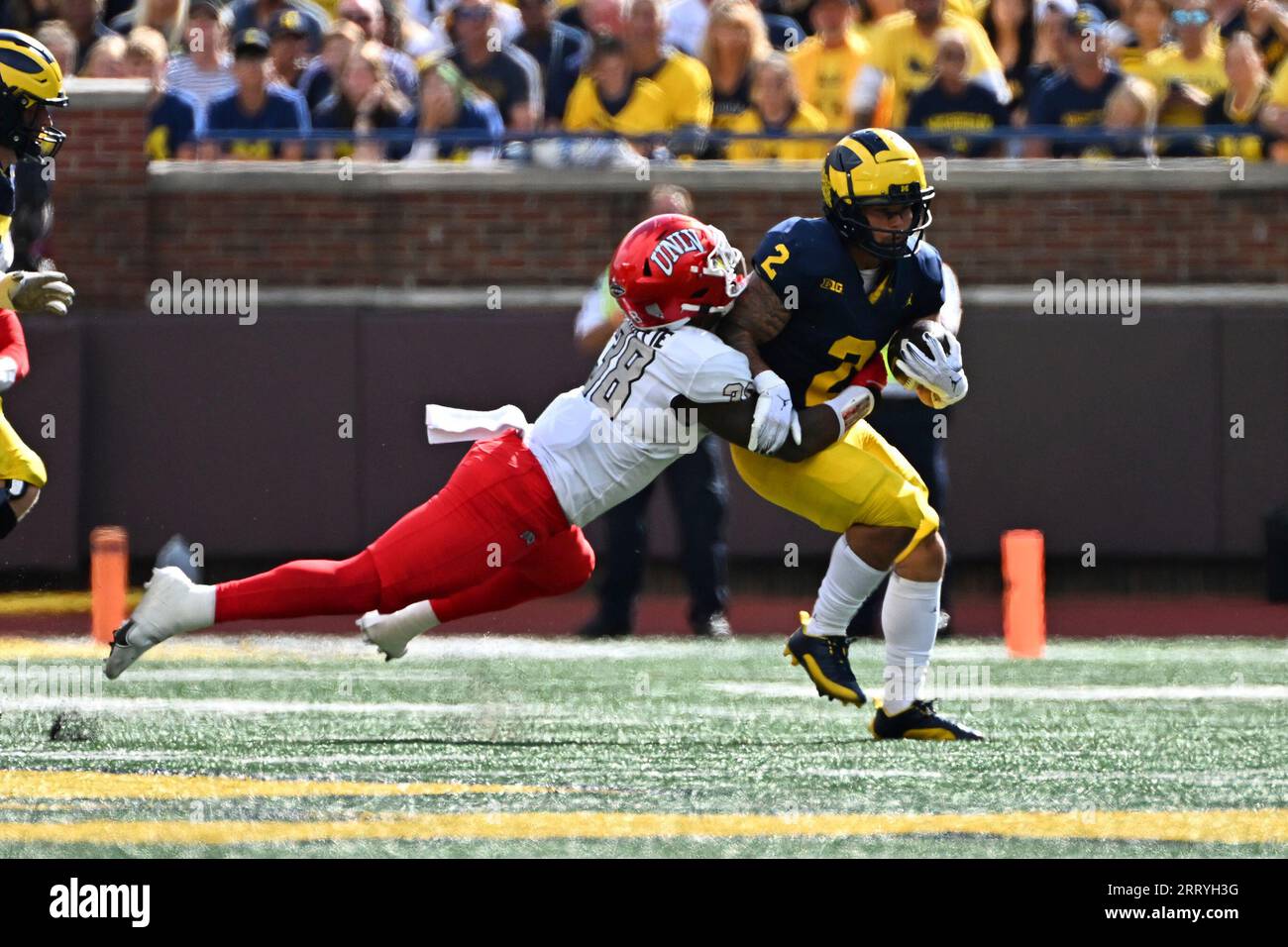 ANN ARBOR, MI - SEPTEMBER 09: Michigan Wolverines running back Blake Corum (2) runs wide for a ...