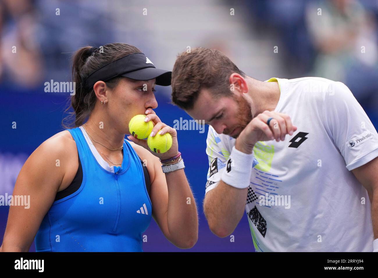 Jessica Pegula and Austin Krajicek in action during a mixed doubles championship match at the ...
