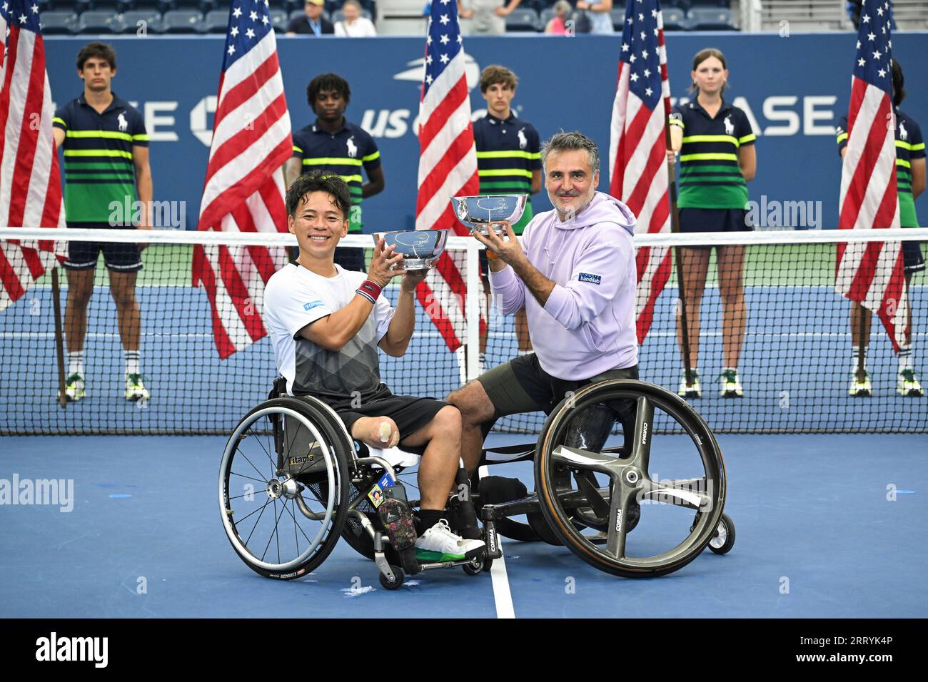 Takashi Sanada and Stephane Houdet pose for a photo during a trophy ...