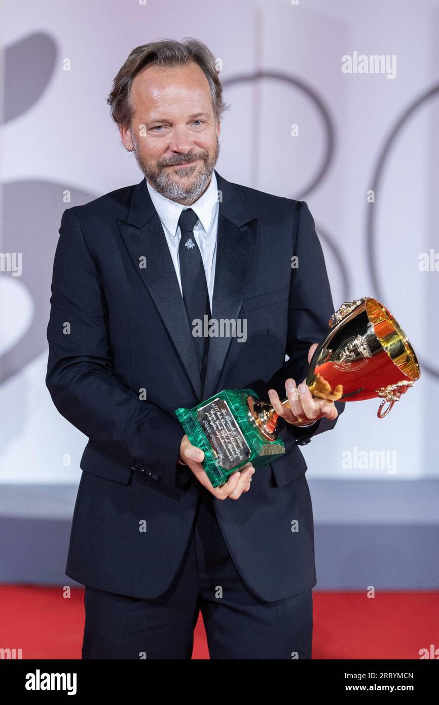 Venice, Italy. 09th Sep, 2023. Peter Sarsgaard poses with the Coppa ...