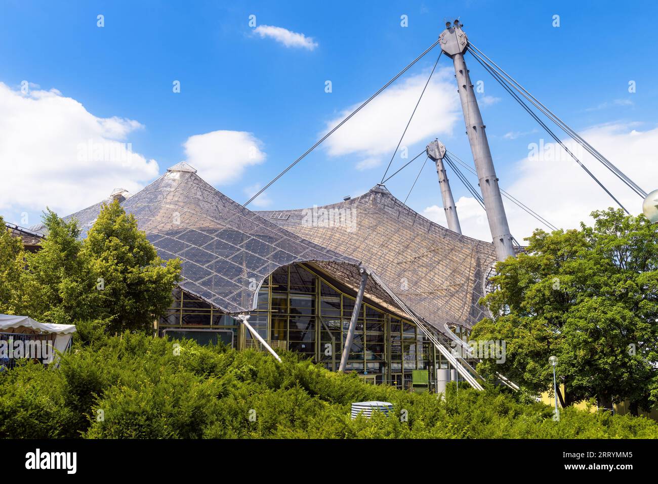 Glass tension roof in Olympic park in summer, Munich, Germany. Scenic ...