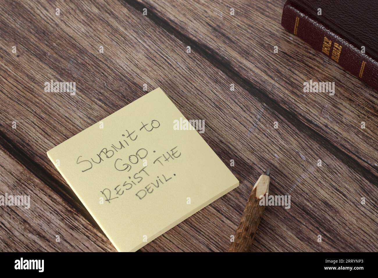 Submit to God, resist the devil, handwritten verse on note with pencil ...