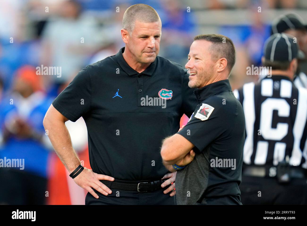 Florida head coach Billy Napier, left, and McNeese State head coach ...