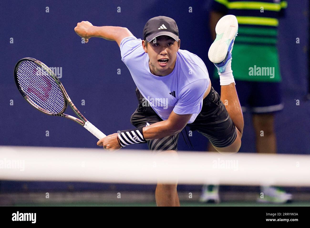 Learner Tien, of the United States, serves to Joao Fonseca, of Brazil ...