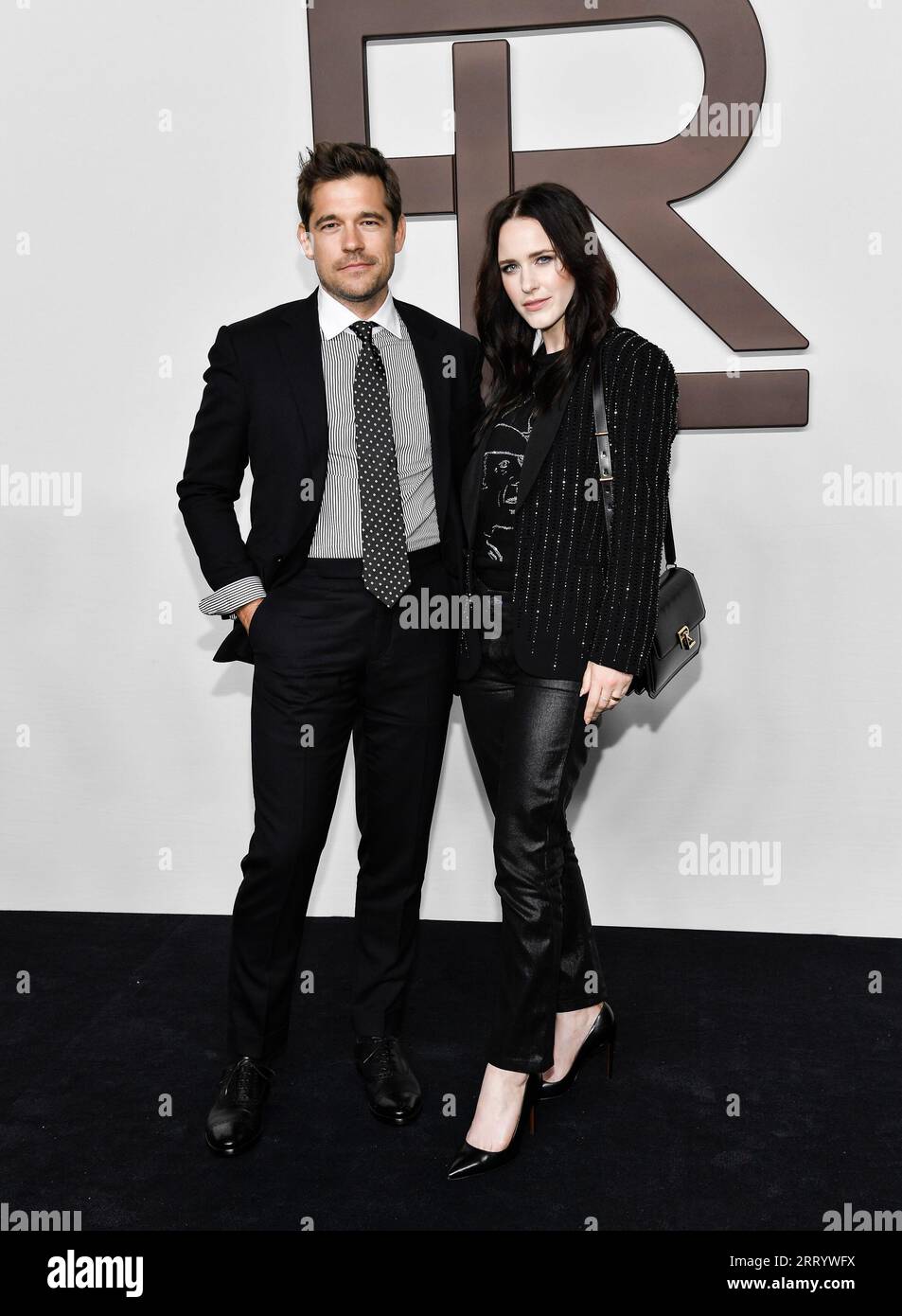 Jason Ralph, left, and Rachel Brosnahan attend the Ralph Lauren Spring ...