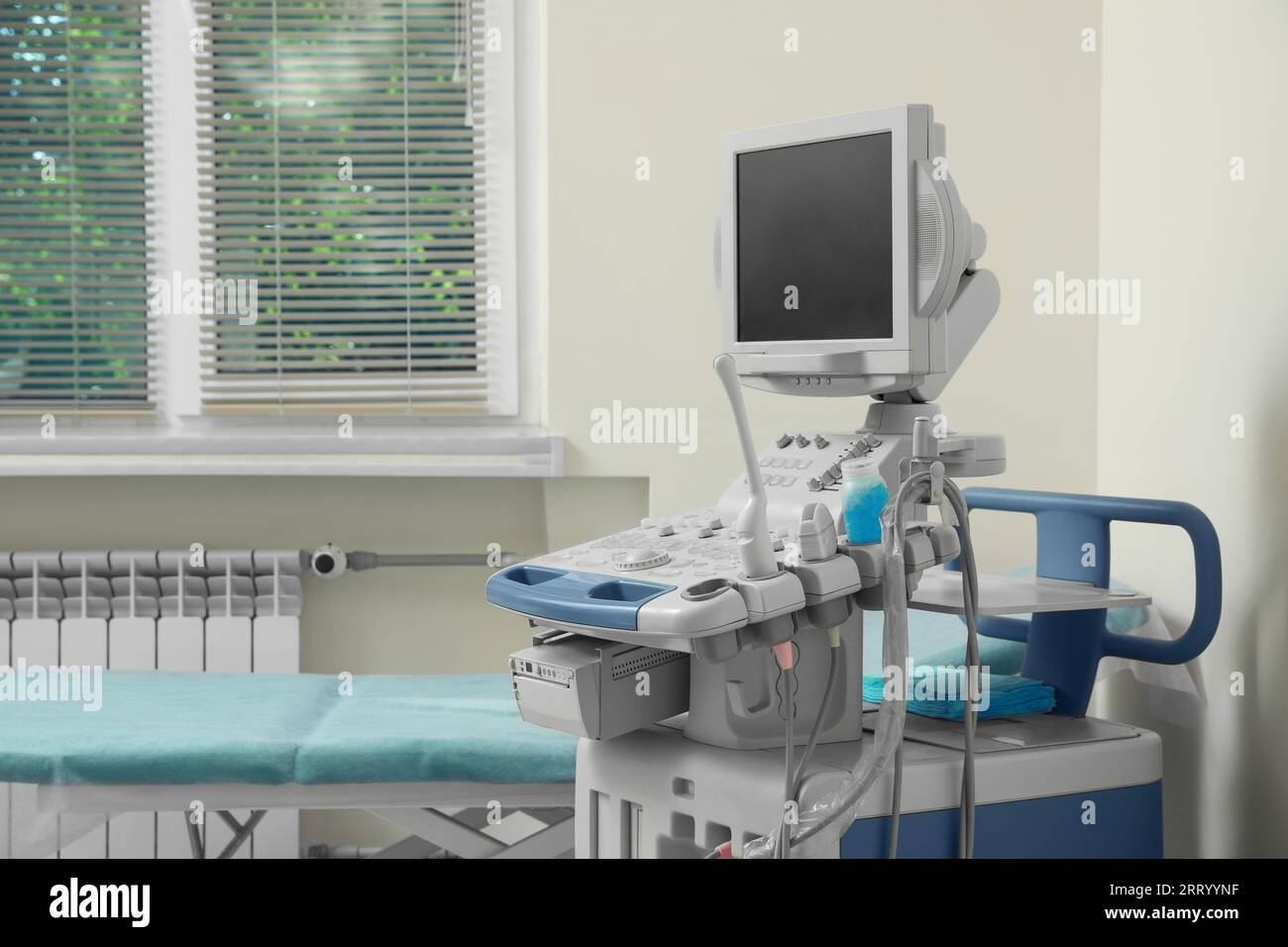 Ultrasound machine and examination table in hospital Stock Photo - Alamy