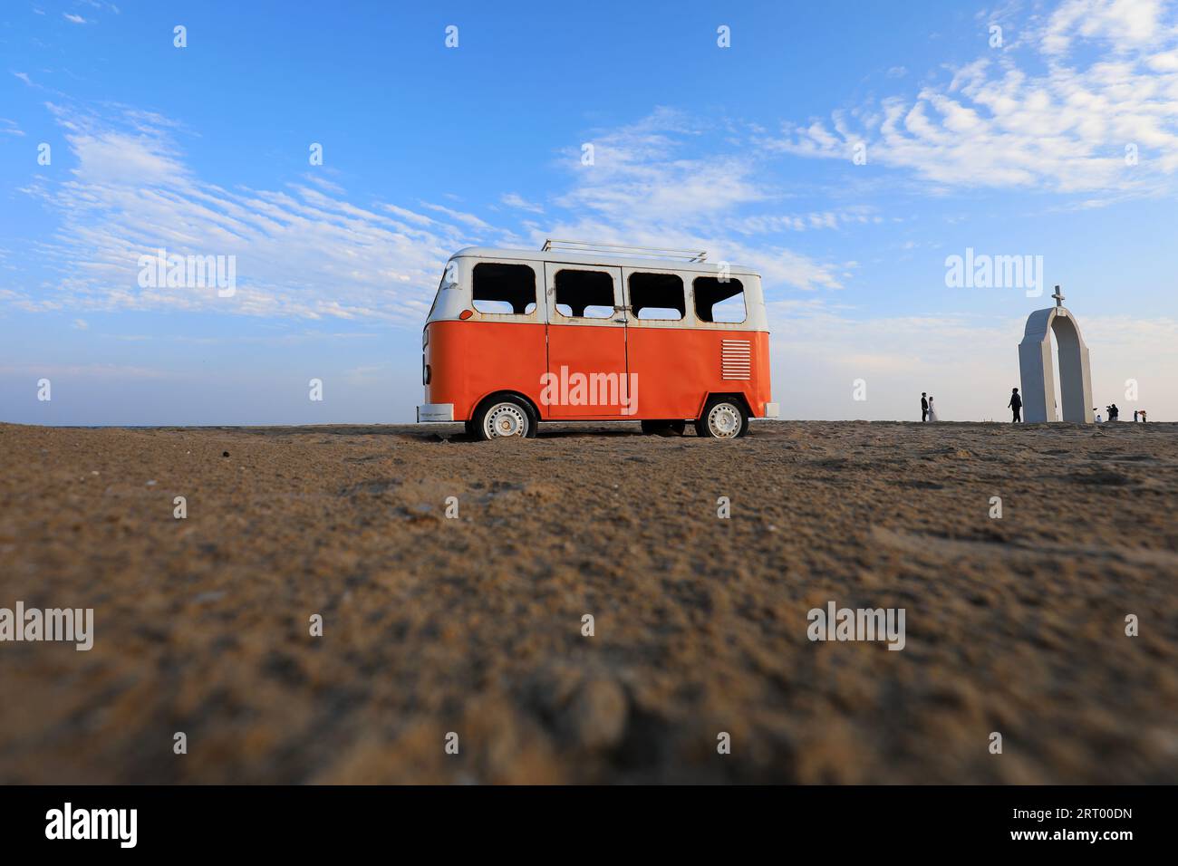 The red bus model is on the beach at a scenic spot Stock Photo - Alamy