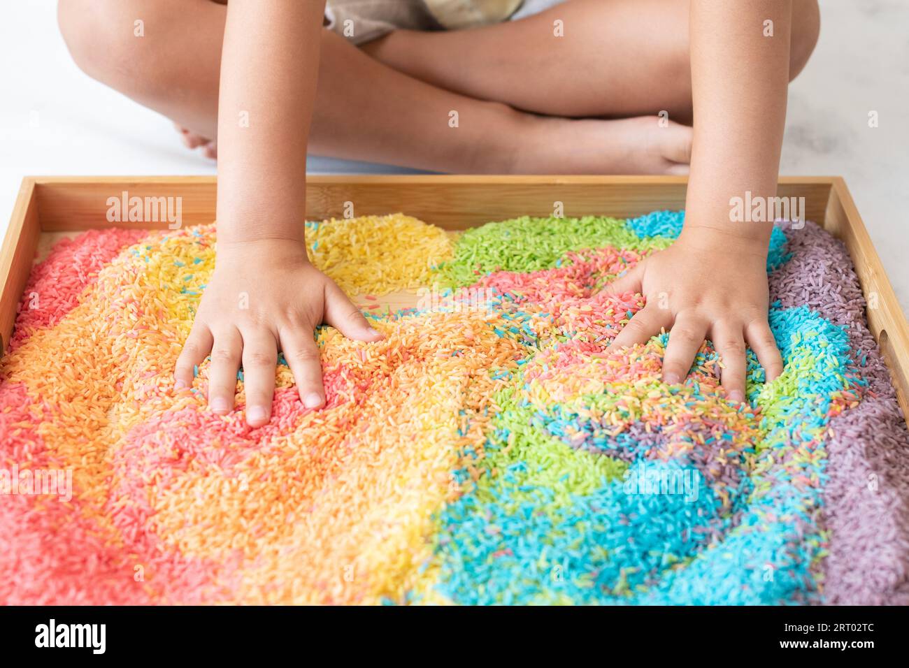 Kids hands touch play in hi-res stock photography and images - Alamy
