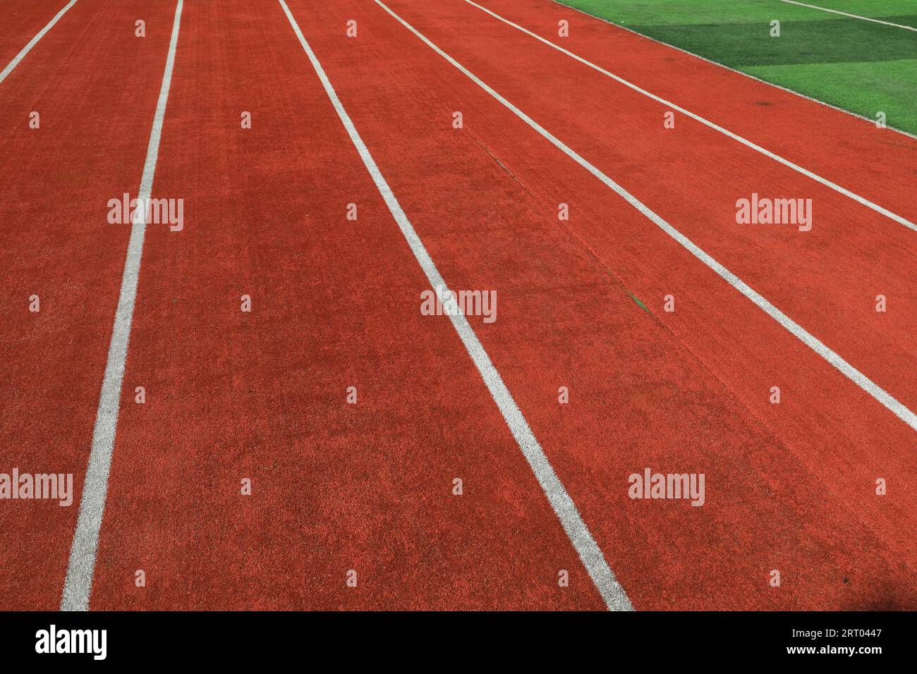 The red plastic track is on the playground Stock Photo - Alamy