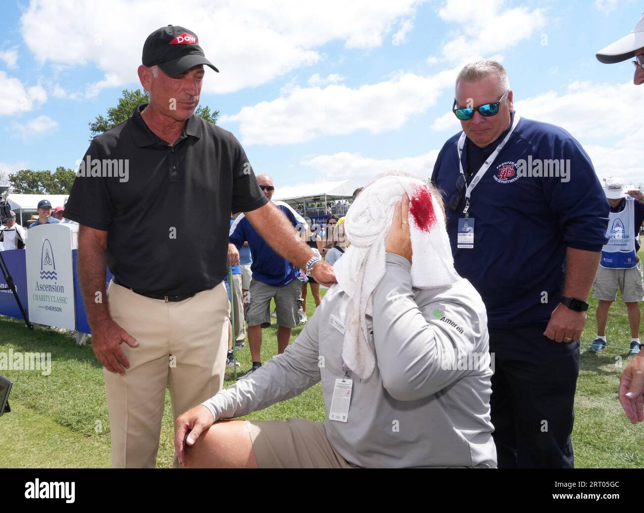 St. Louis, United States. 13th Sep, 2023. Golfer Corey Pavin (L) checks ...