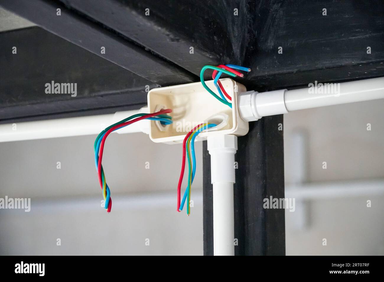 Electrician repair wire in PVC Conduit , renovate home Stock Photo - Alamy