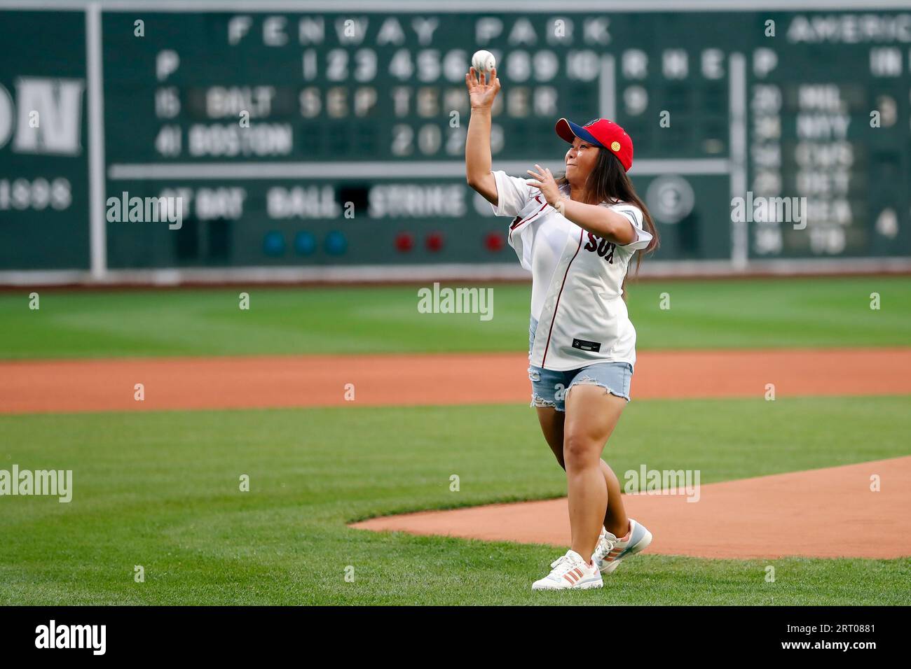 LPGA golfer Megan Khang throws out the ceremonial first pitch before a ...