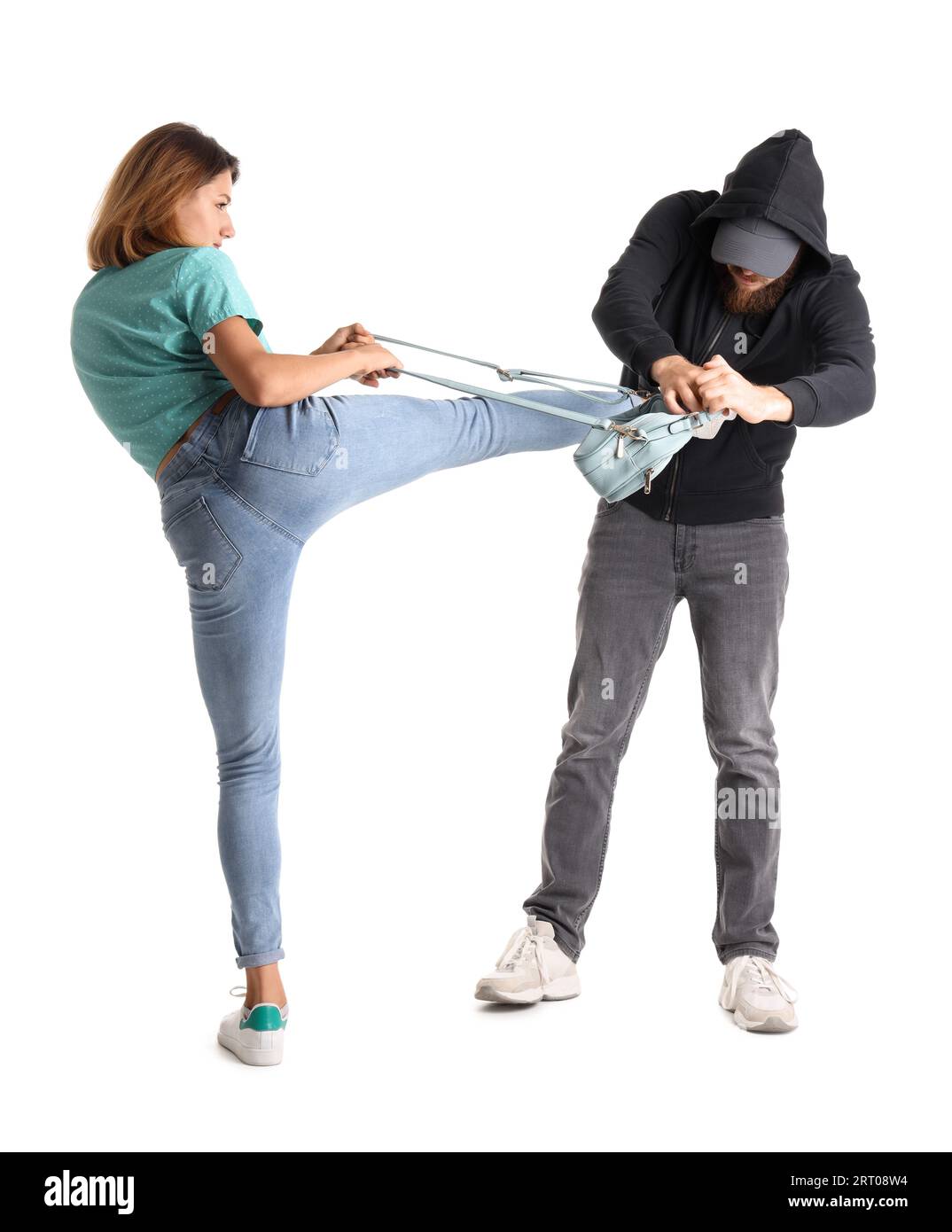 Young woman defending herself against robber on white background Stock ...