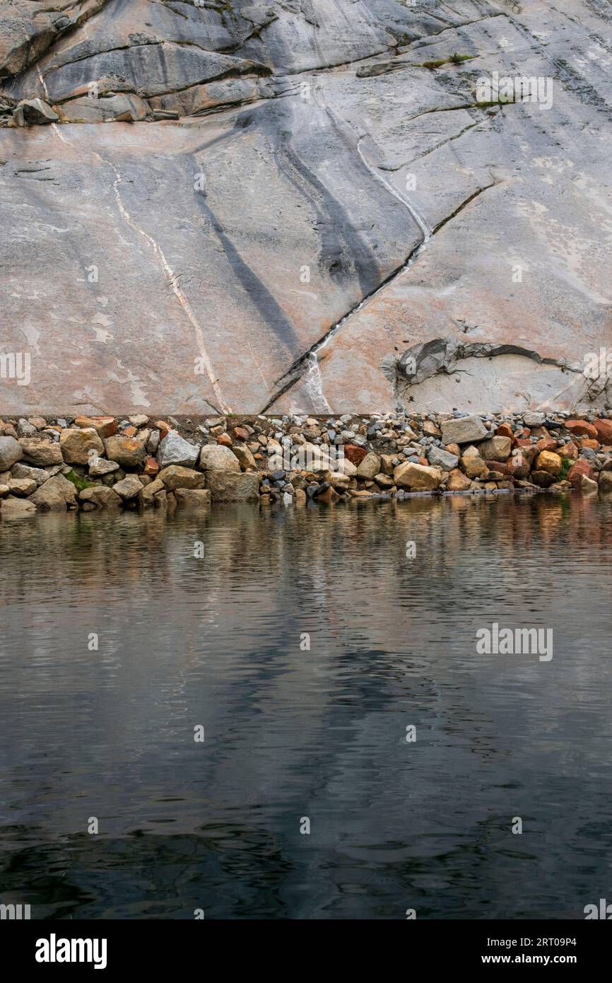 Temporary waterfalls form on the granite domes surrounding Tenaya Lake ...