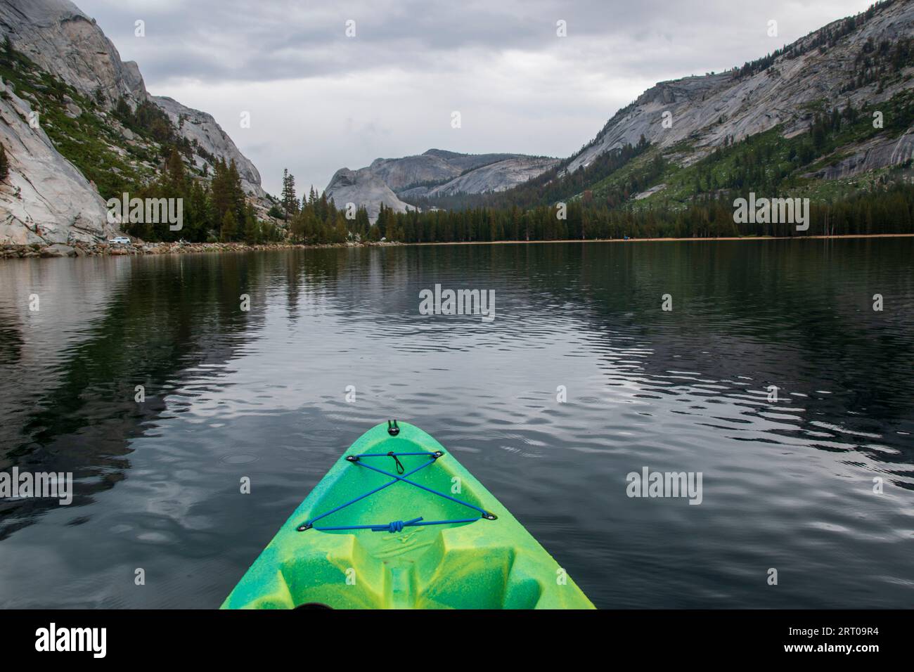 Temporary waterfalls form on the granite domes surrounding Tenaya Lake ...