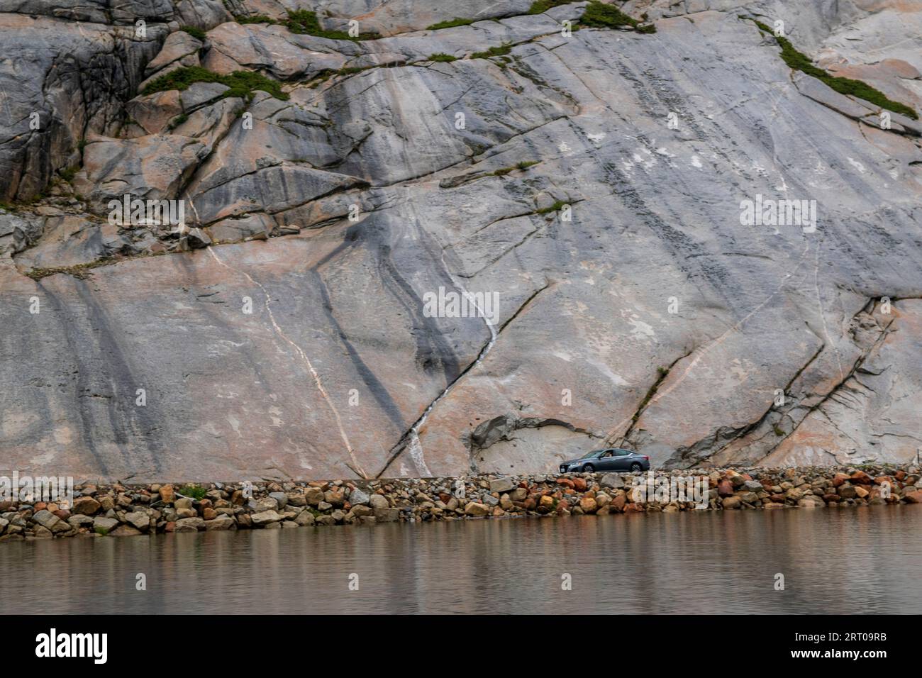 Temporary waterfalls form on the granite domes surrounding Tenaya Lake ...
