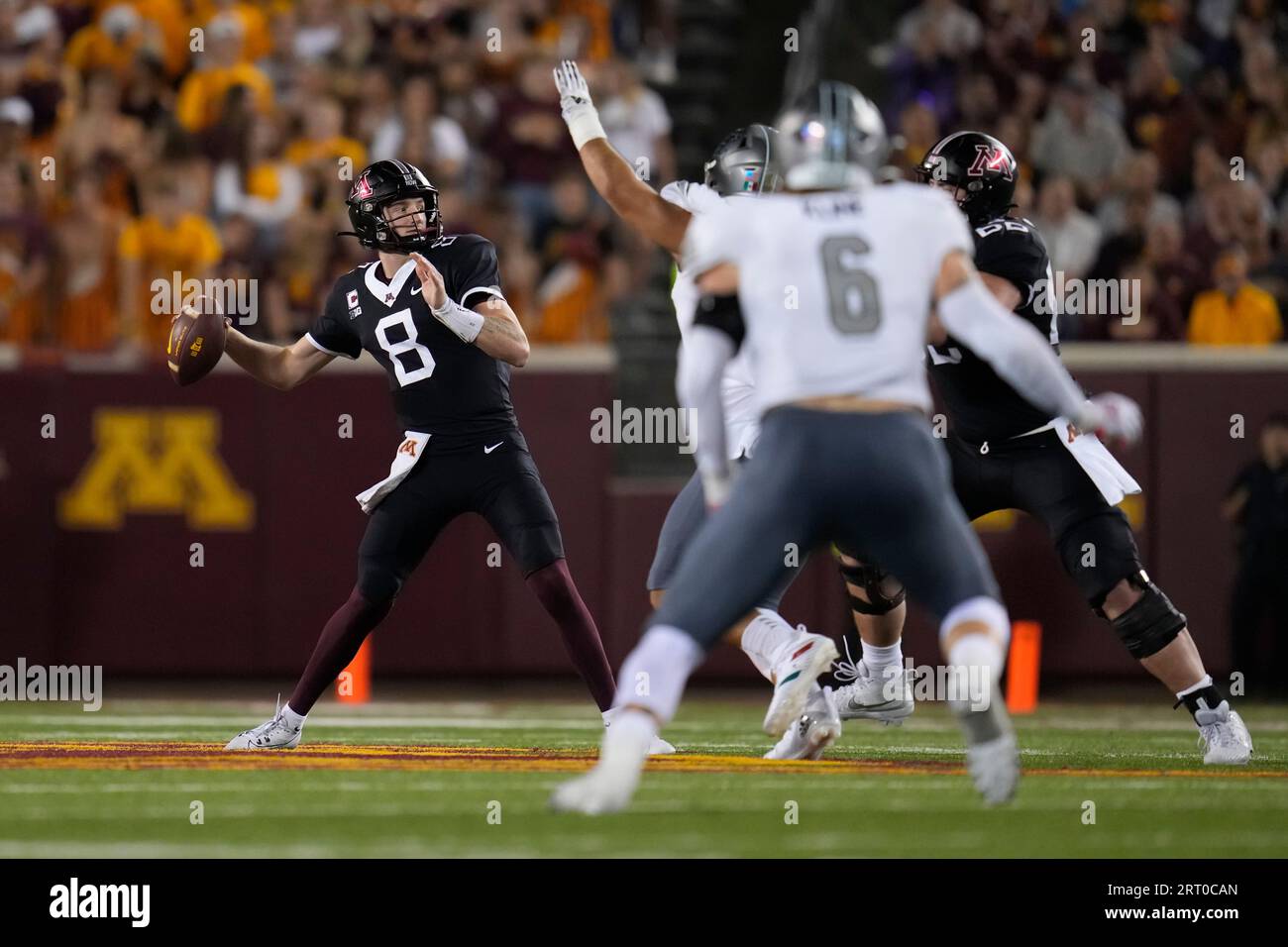 Minnesota quarterback Athan Kaliakmanis (8) looks for a receiver during ...