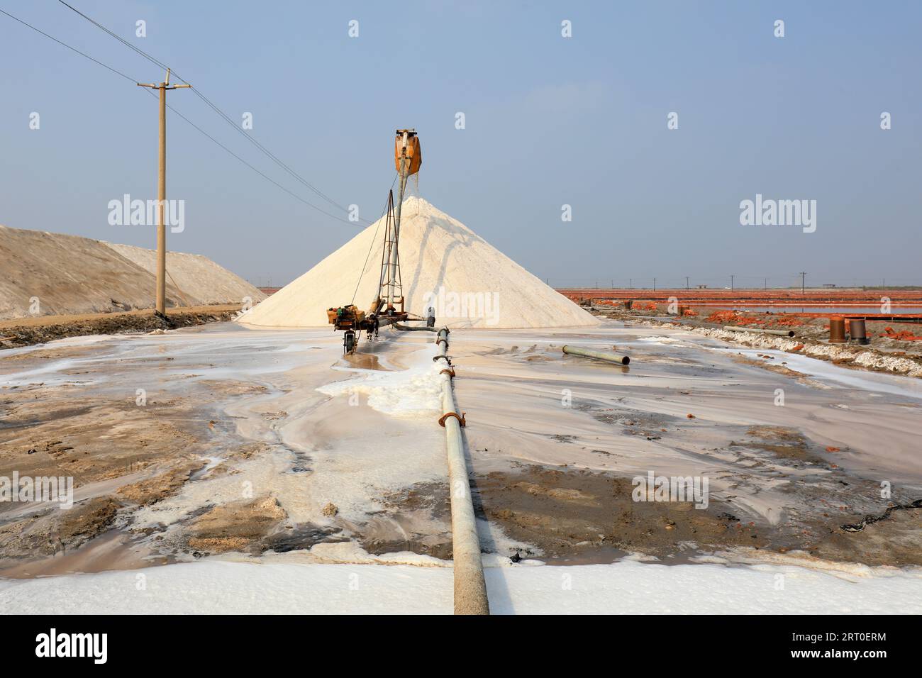 Raw salt production equipment in operation in a saltworks, North China ...