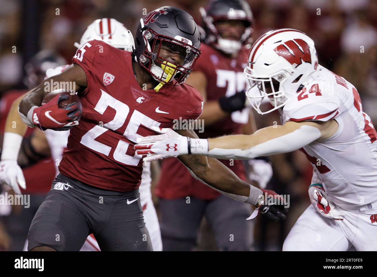 Washington State running back Nakia Watson (25) carries the ball while ...