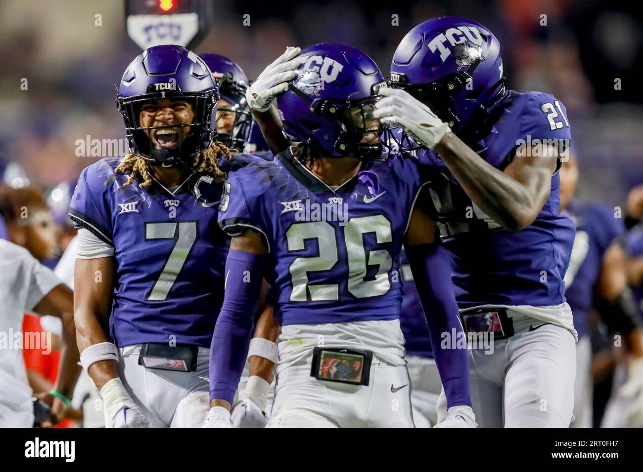 TCU players Channing Canada (7), Vernon Glover (26), and Bud Clark (21 ...