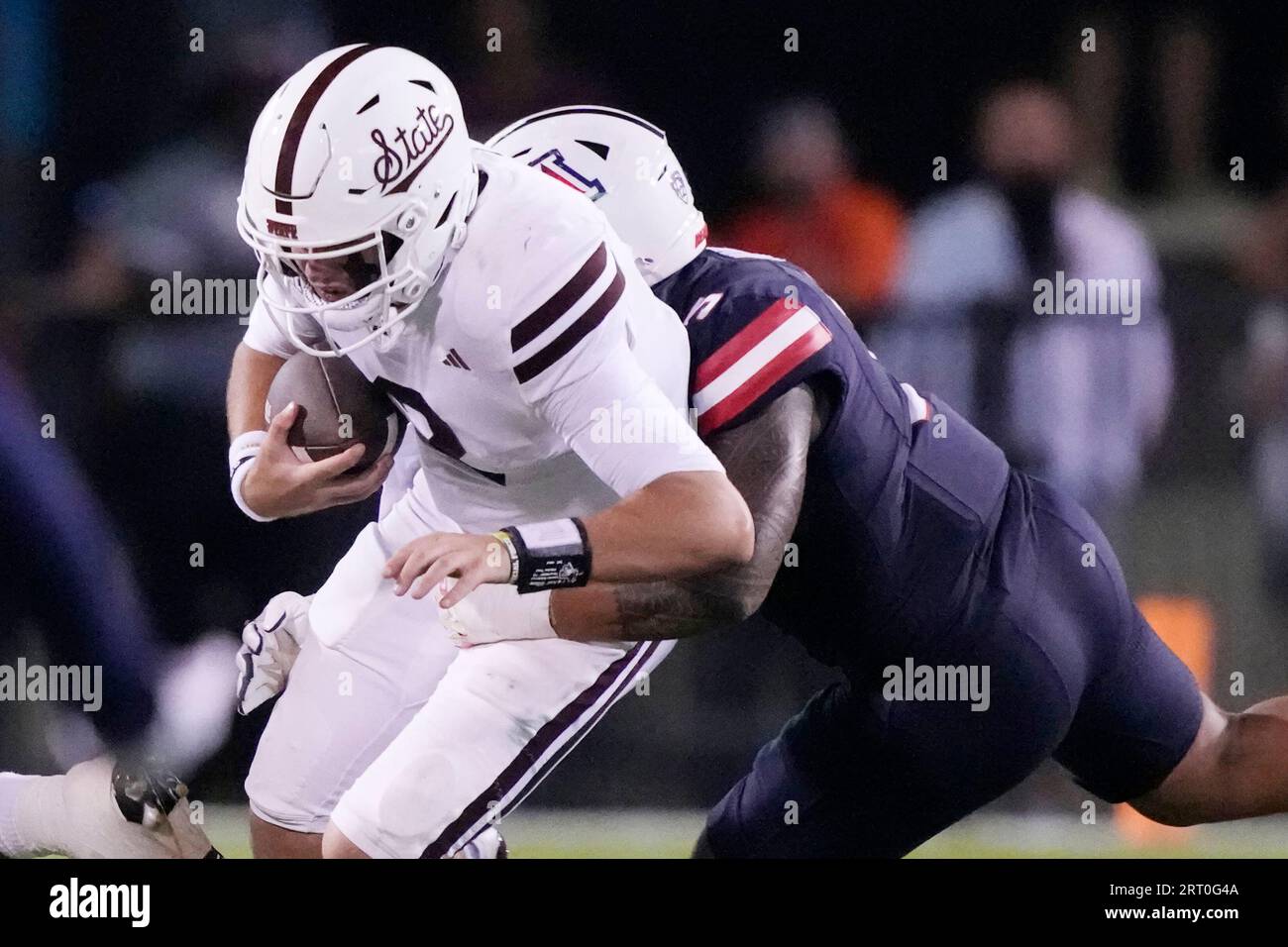 Mississippi State quarterback Will Rogers (2) is sacked by Arizona ...