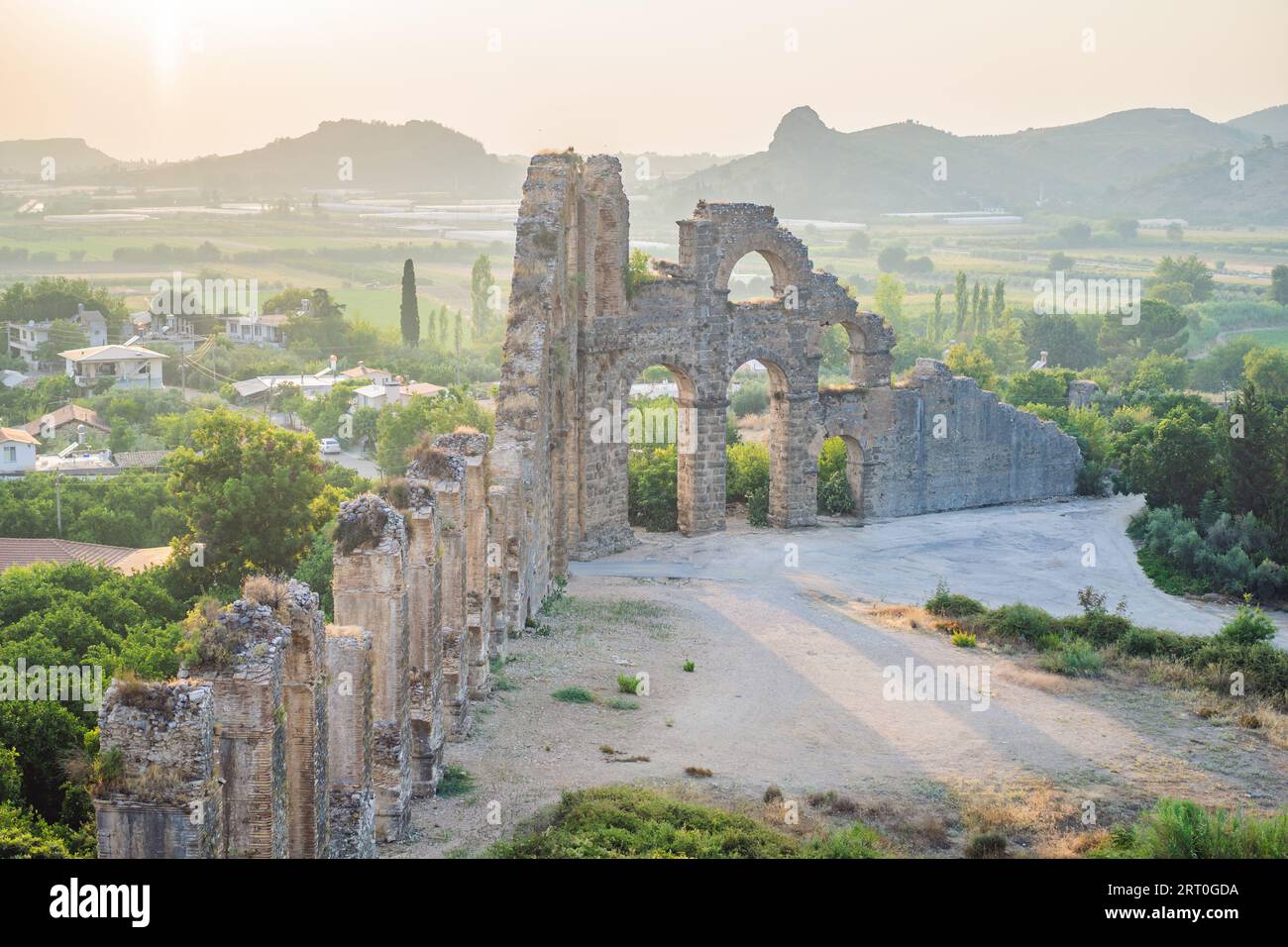 Aspendos Ancient City. Aspendos acropolis city ruins, cisterns, aqueducts and old temple ...