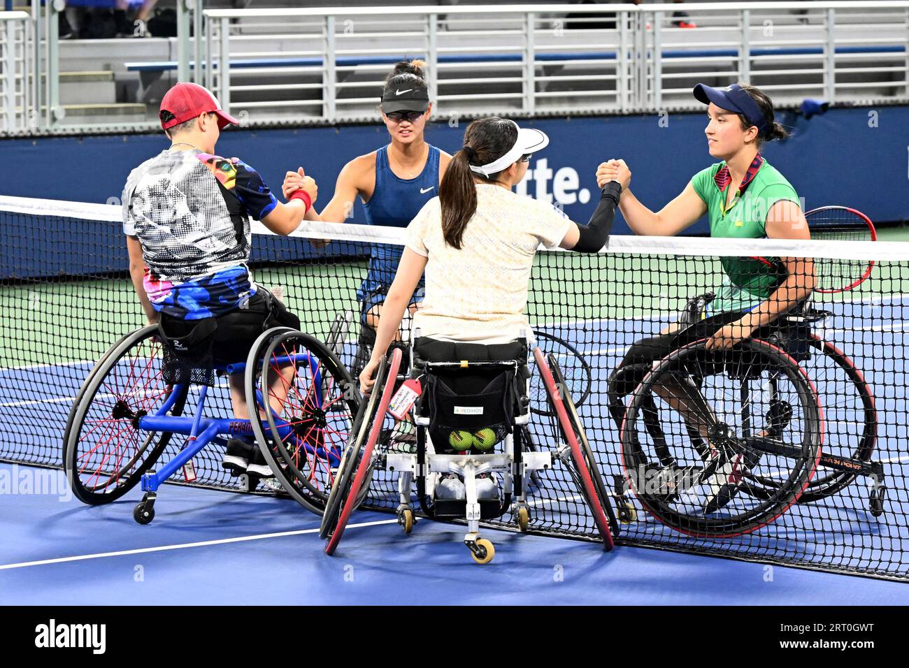 Maylee Phelps and Ksenia Chasteau shake hands with Sabina Czauz and ...