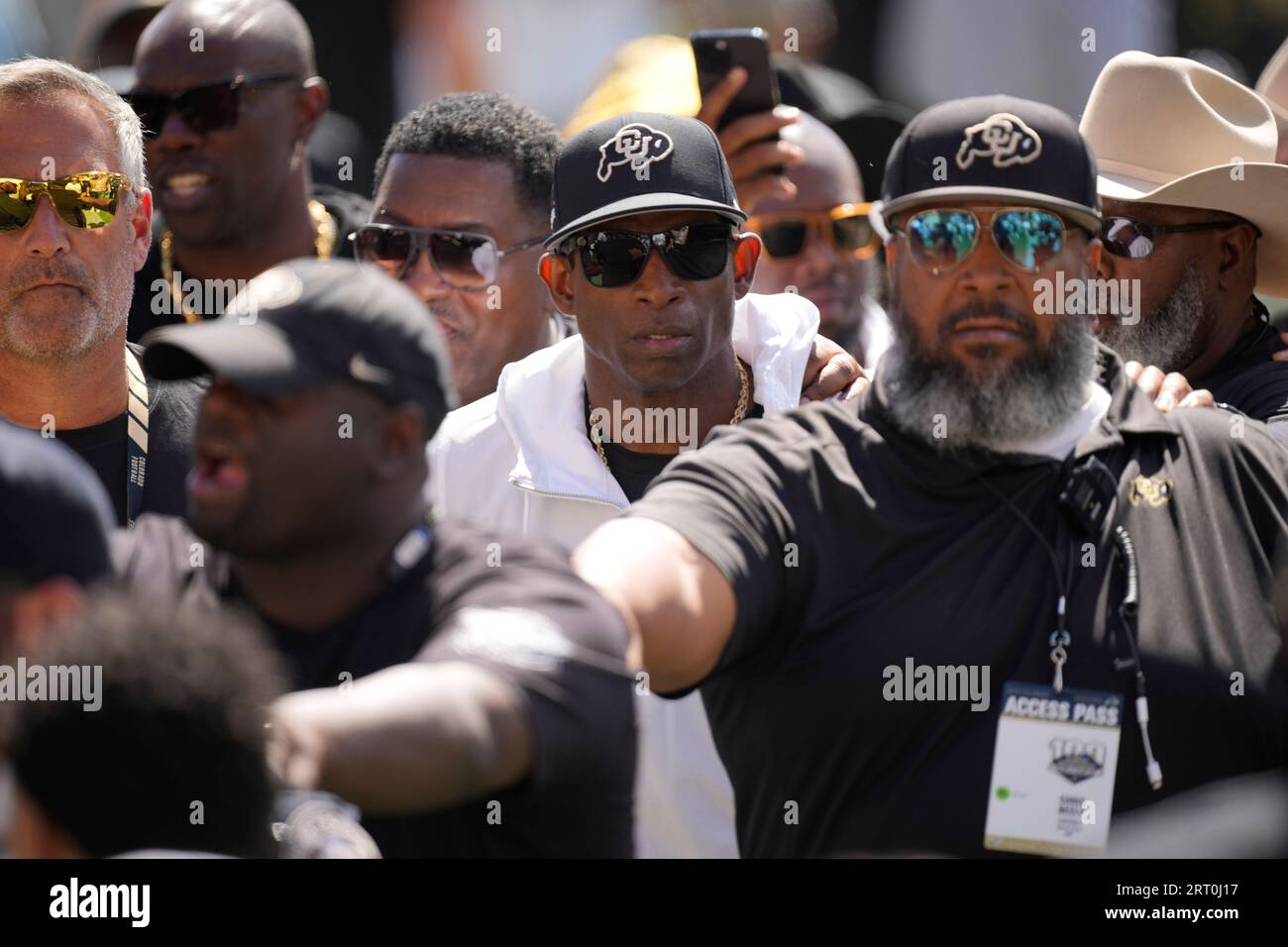 Colorado head coach Deion Sanders is escorted off the field after the ...