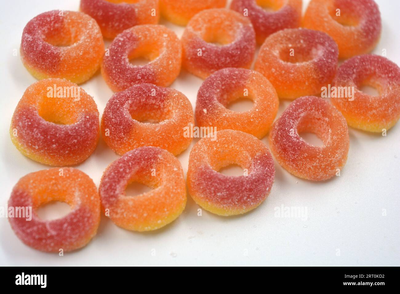 Beautiful and bright colored sweets in the form of orange and red ...