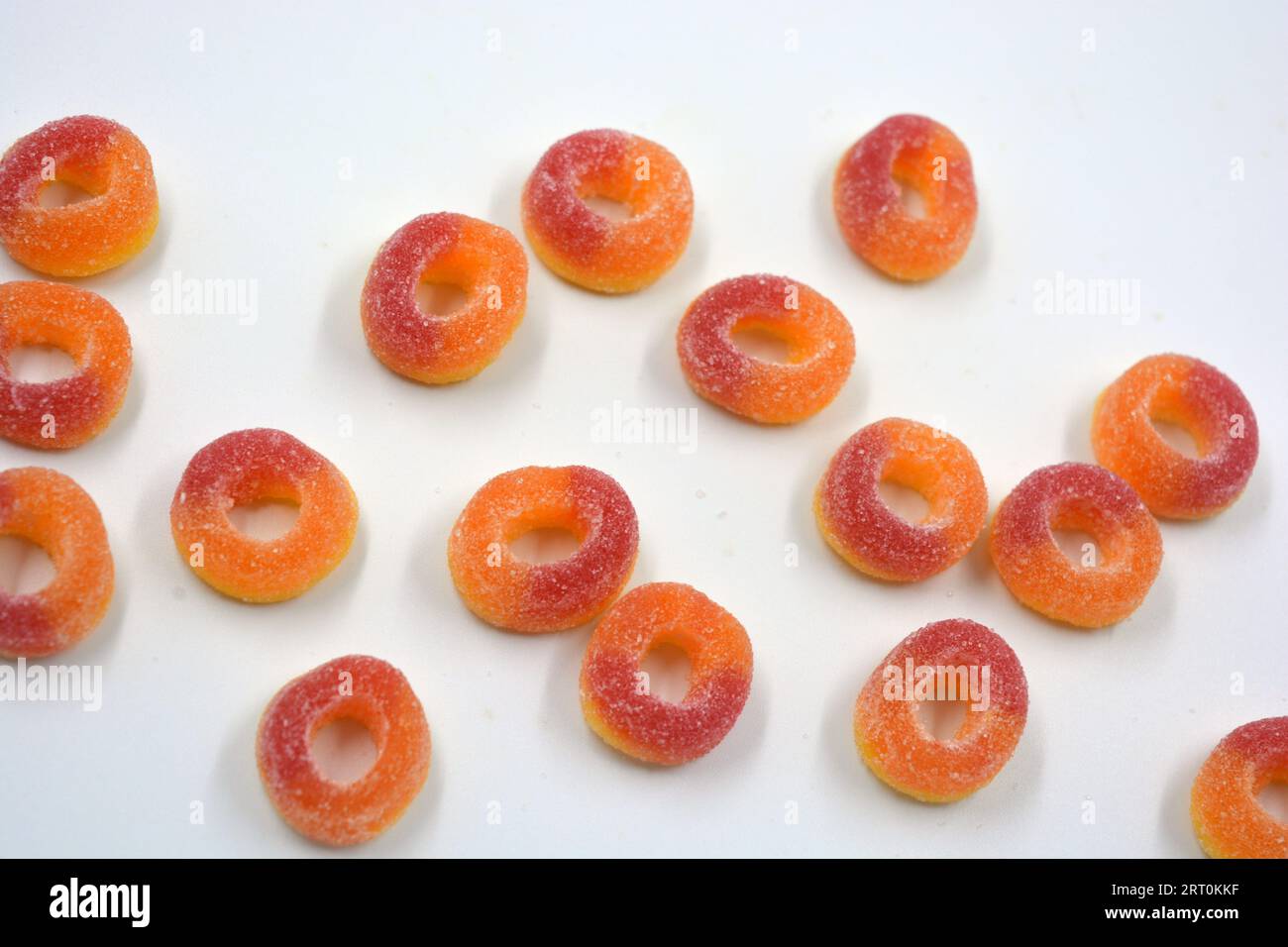 Beautiful and bright colored sweets in the form of orange and red ...