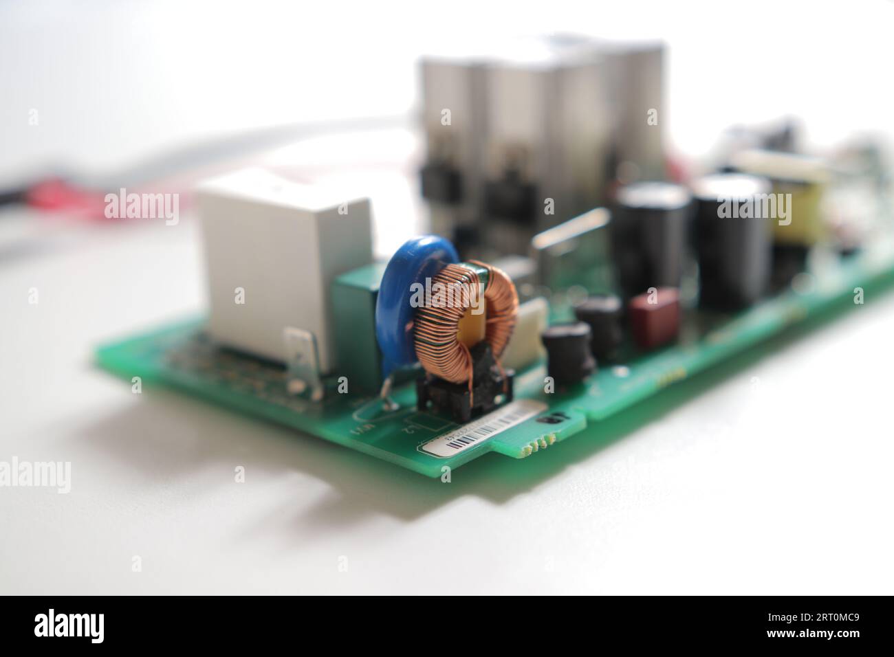 Power Supply modern printed-circuit board with electronic components ...