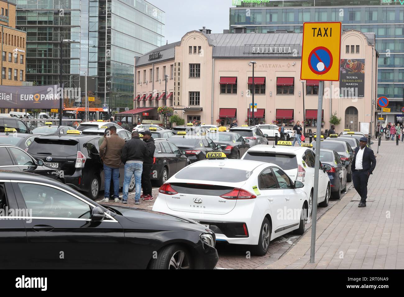 Helsinki, Finland - September 5, 2023: Taxi stand with cabs waiting ...