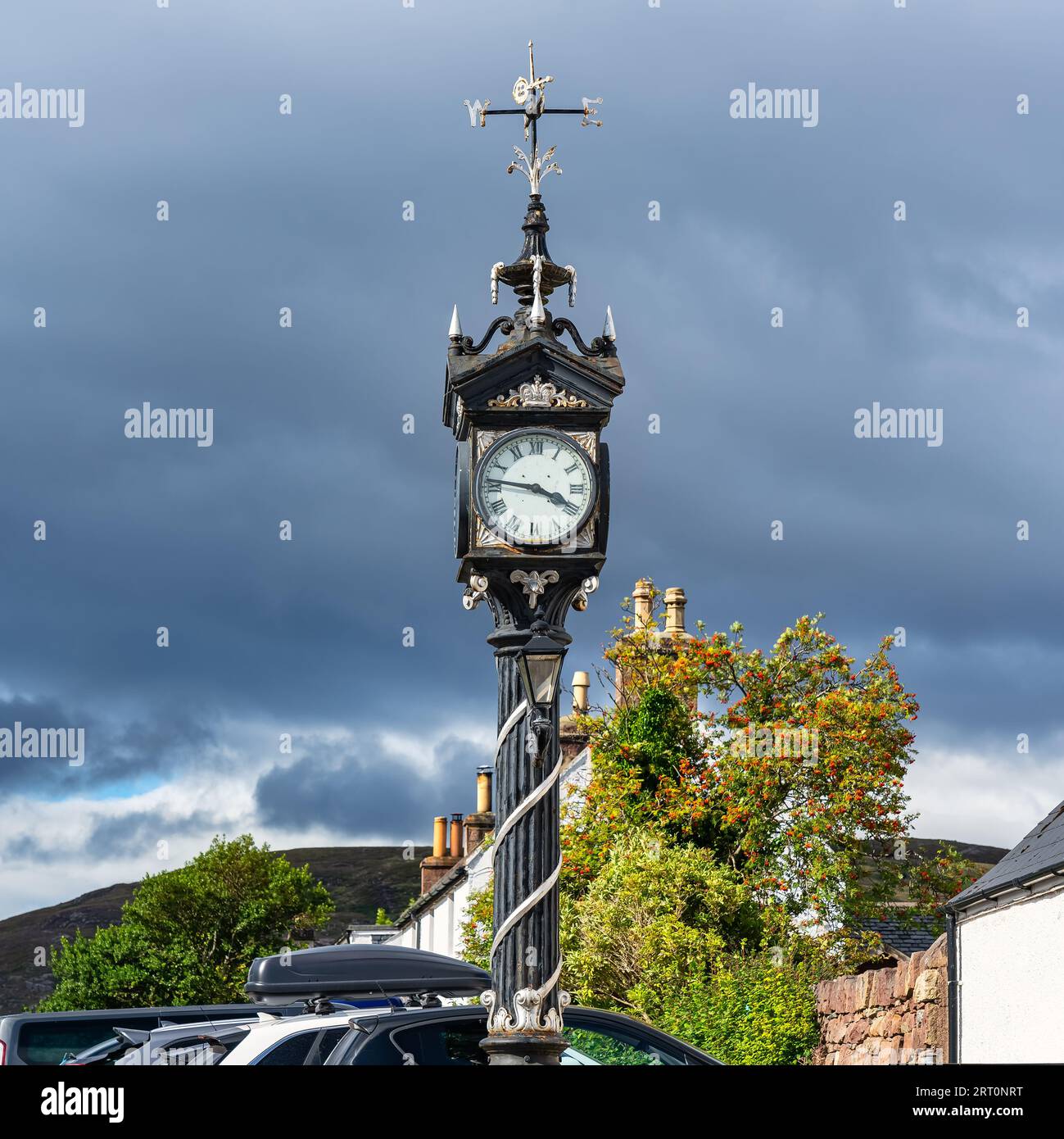 Street clock in the coastal town of Ullapool on the west coast of ...