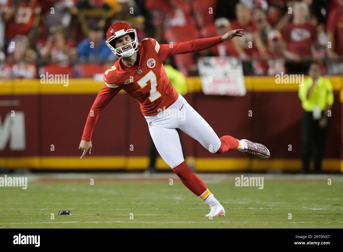 Kansas City Chiefs place kicker Harrison Butker kicks the ball during ...