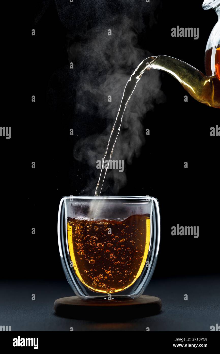 Tea pouring double wall hi-res stock photography and images - Alamy
