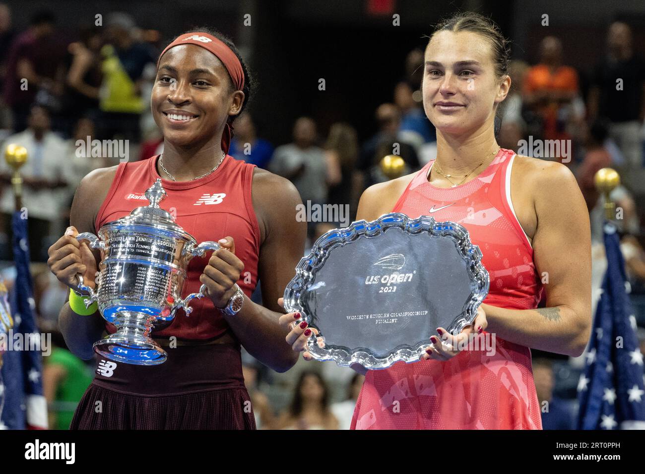 Coco Gauff of USA as winner and Aryna Sabalenka as runner-up hold ...