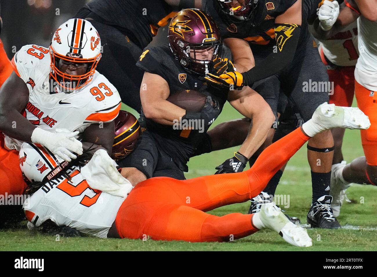 Arizona State running back Cameron Skattebo (4) is tackled by Oklahoma ...