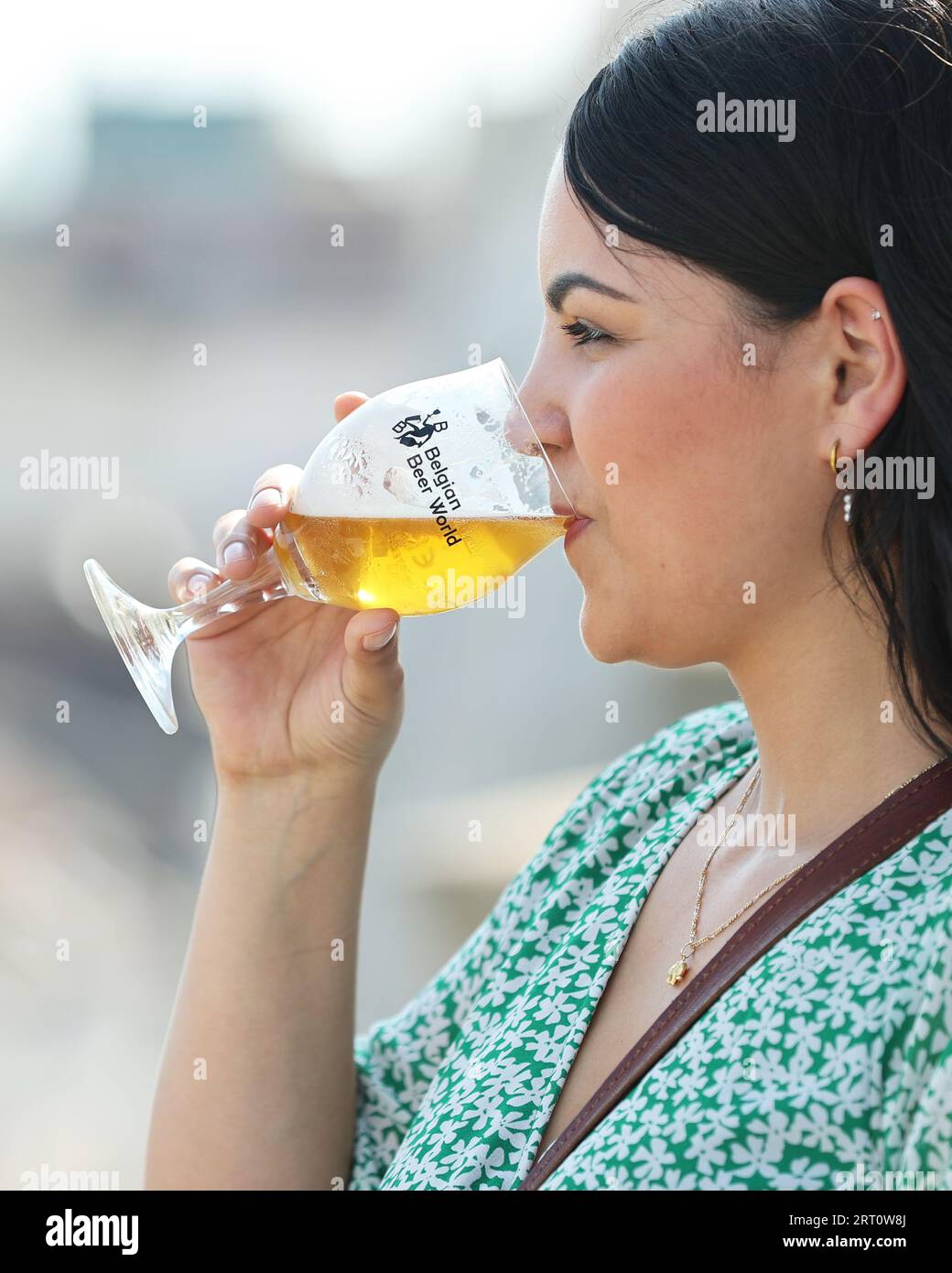 Brussels, Belgium. 9th Sep, 2023. A visitor enjoys beer at a rooftop ...