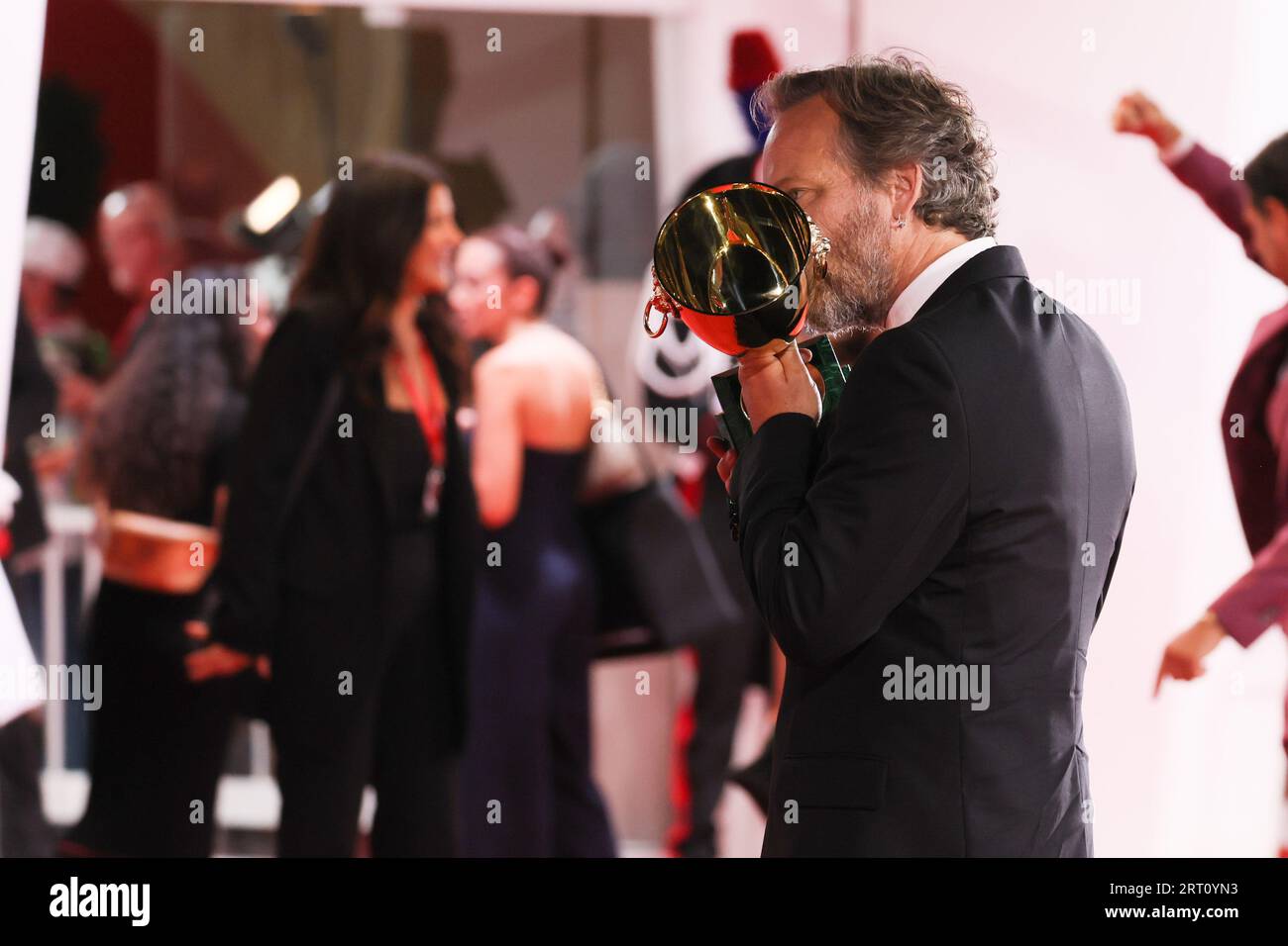 Peter Sarsgaard poses with the Best Actor Award for 'Memory' at the ...
