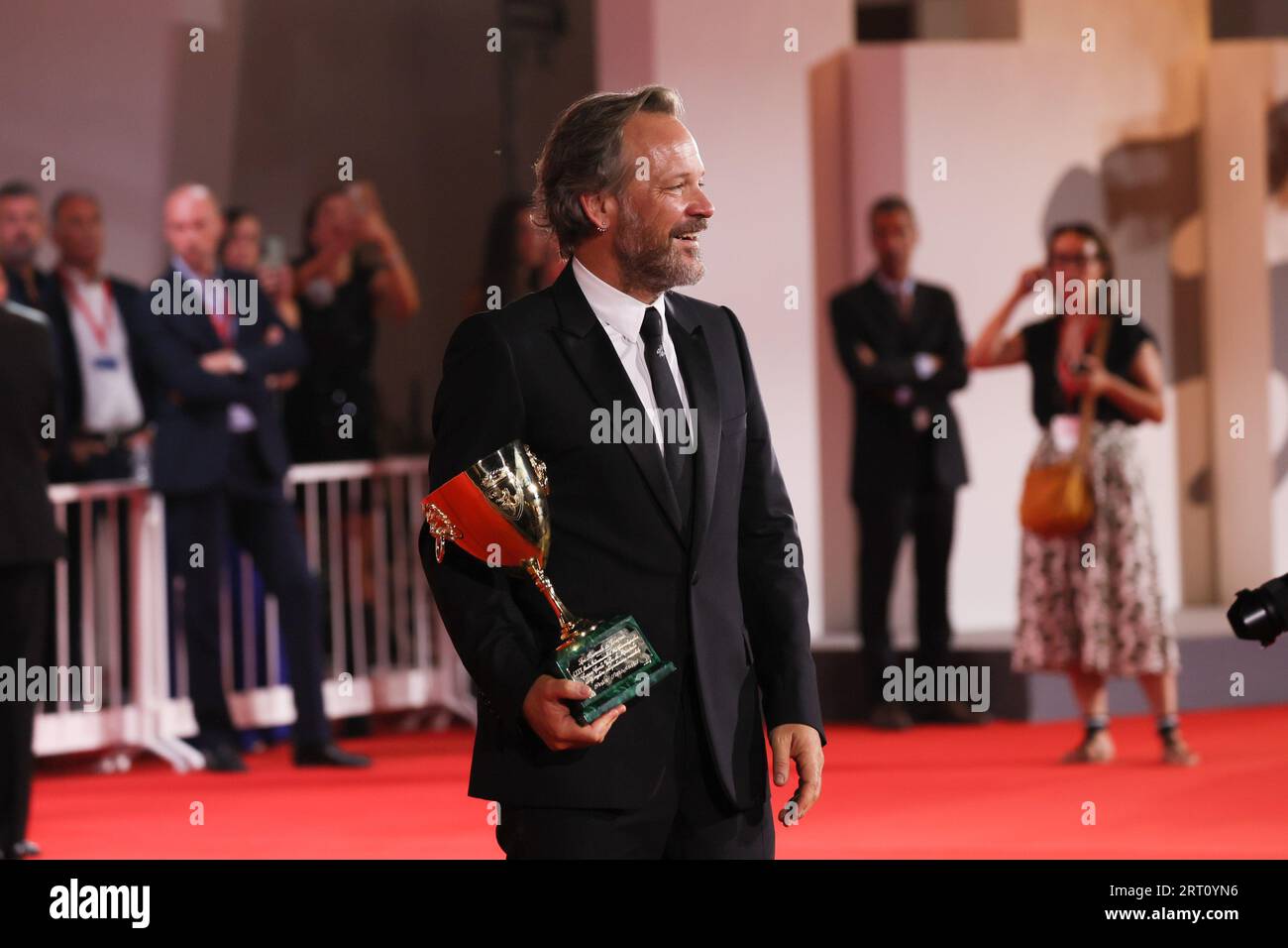 Peter Sarsgaard poses with the Best Actor Award for 'Memory' at the ...