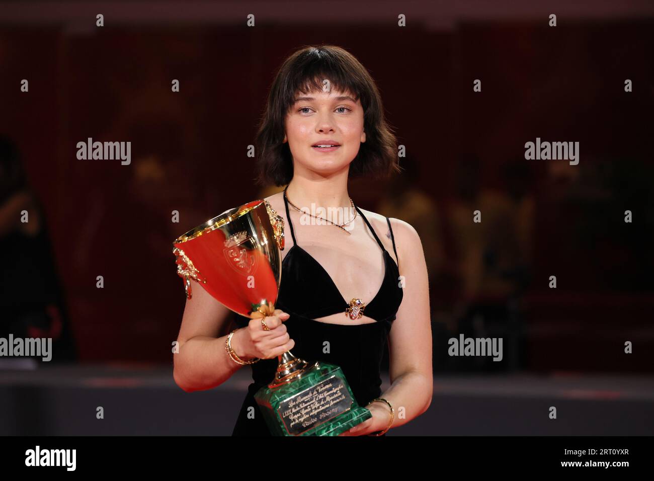Cailee Spaeny poses with the Volpi Cup for Best Actress Award for ...