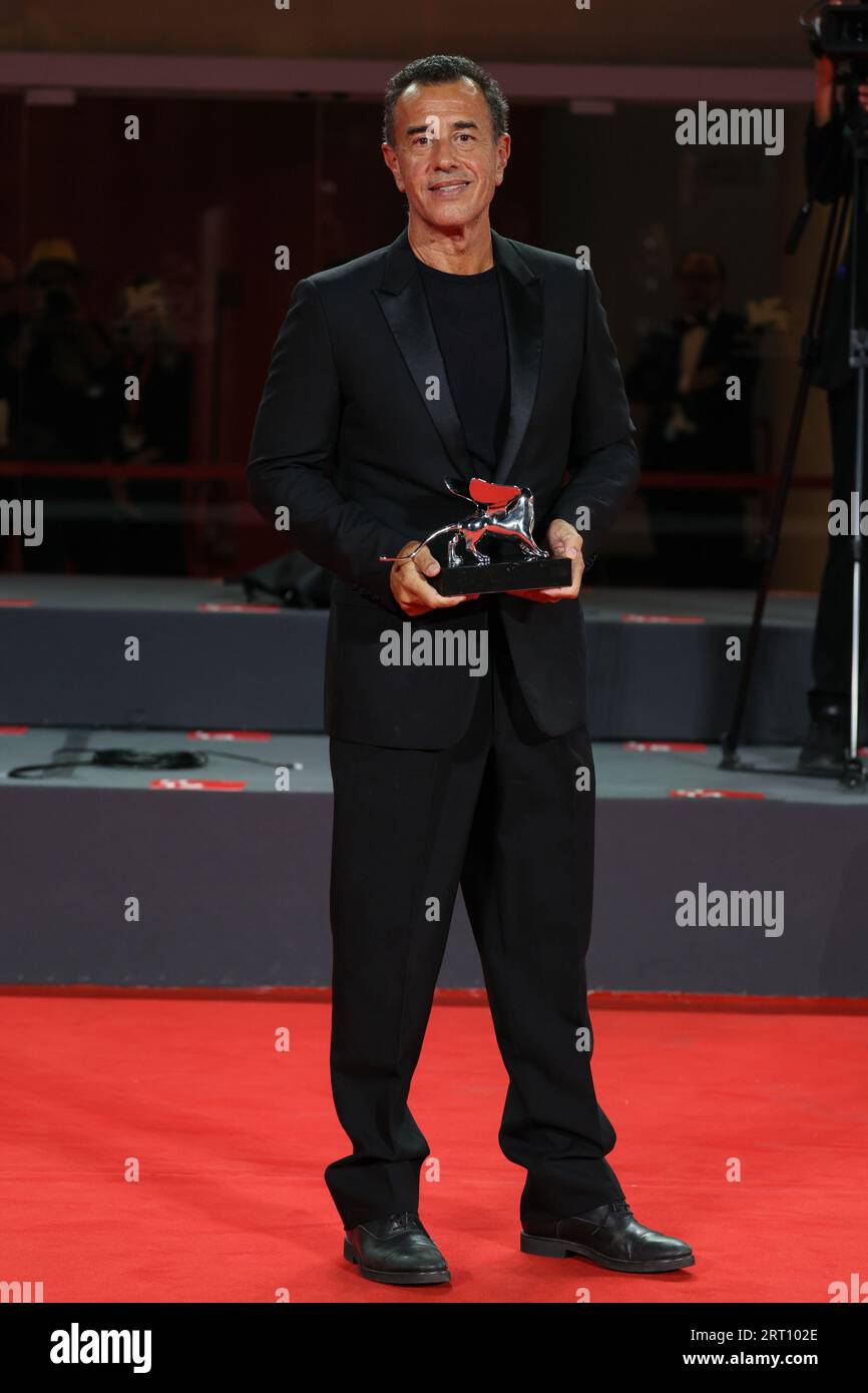 Matteo Garrone poses with the Silver Lion for Best Director for film ...