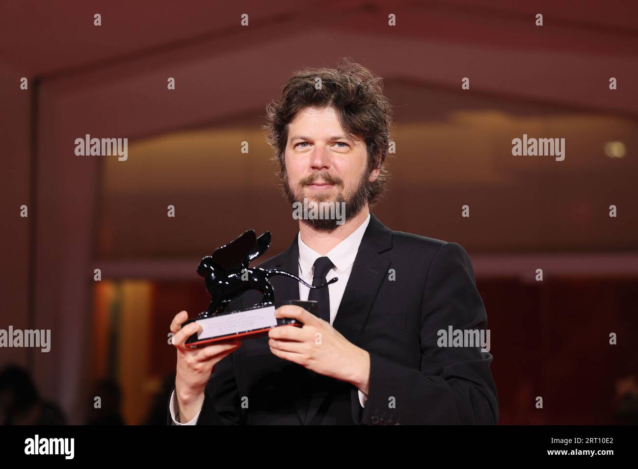 Alex Braverman poses with the Venice Classics Award for Best ...