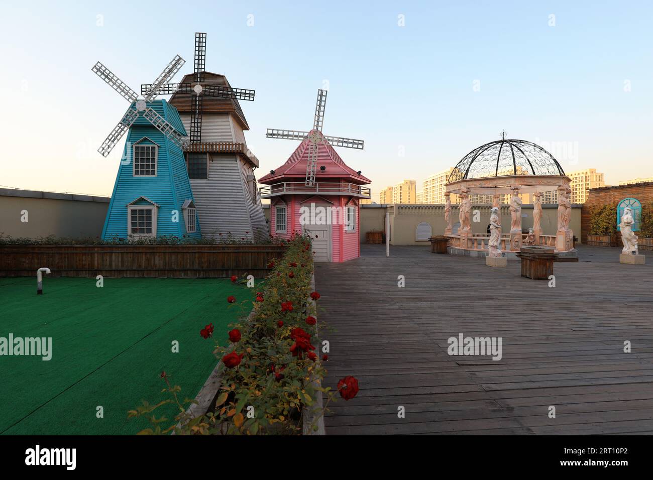 Windmill architecture landscape in a park, North China Stock Photo - Alamy